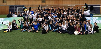 Players spread joy at Junior Christmas Party | Tottenham Hotspur